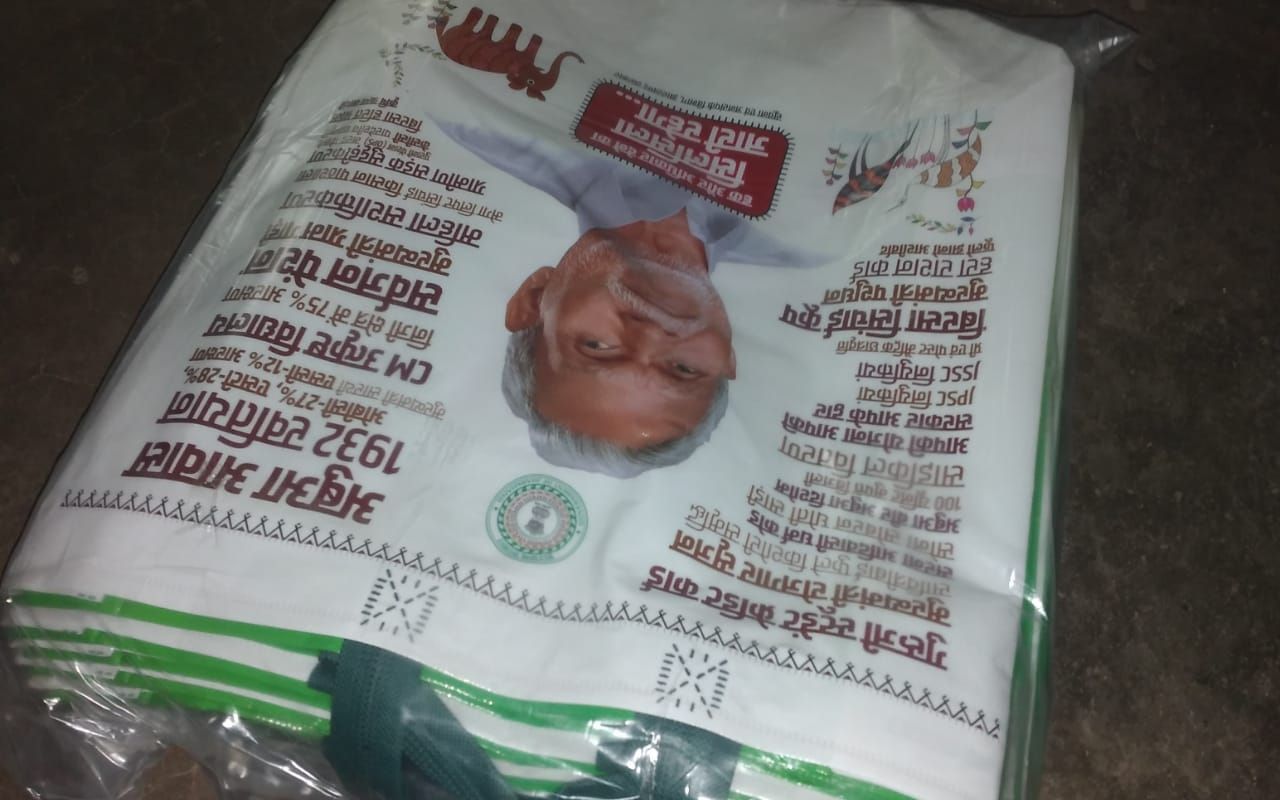 Ration bags with printed Champai Soren’s photo and government schemes ...